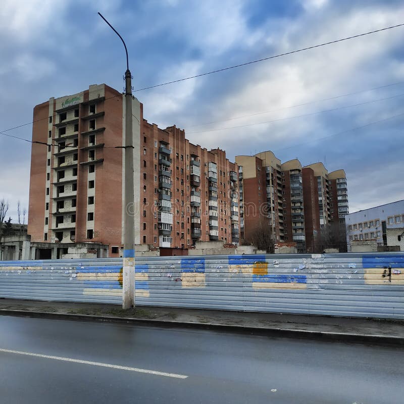 Behind the Fence is an Unfinished High-rise Building Stock Image ...