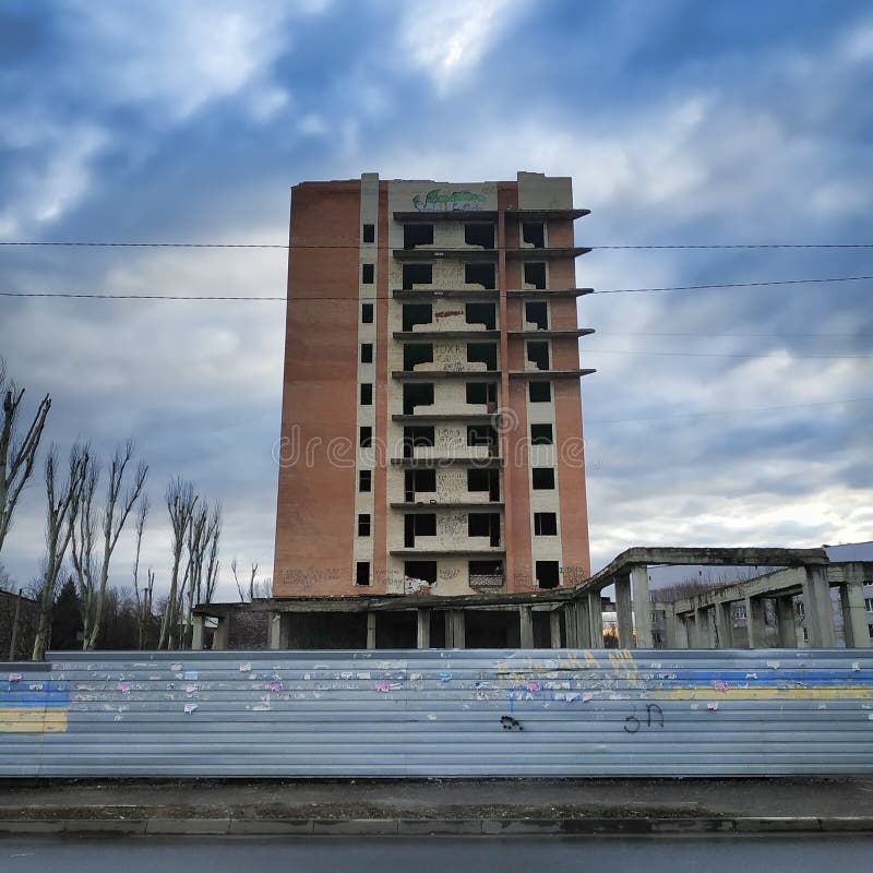 Behind the Fence is an Unfinished High-rise Building Stock Image ...