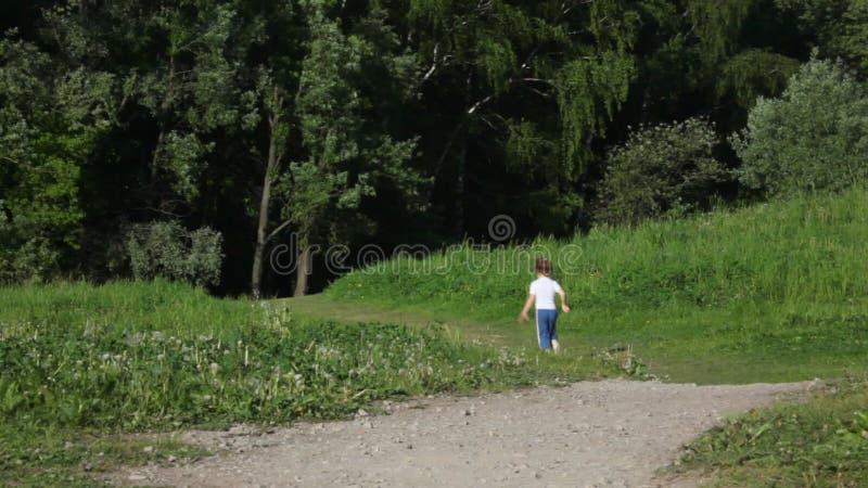 Behind Girl Running Down Path in Sunny Stock Footage - Video of road ...