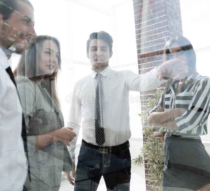 From Behind the Glass.business Team in the Officce Stock Photo - Image ...