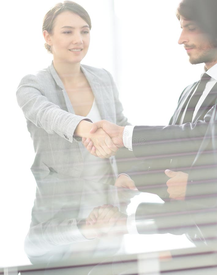 From Behind the Glass.handshake Business People Stock Image - Image of ...