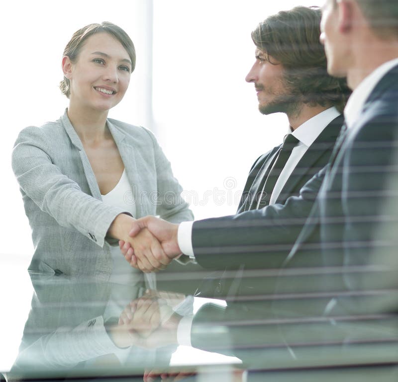 From Behind the Glass.handshake Business People Stock Photo - Image of ...