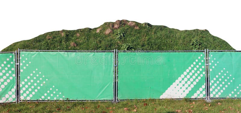 Behind the Green Fence of the Construction Site, a Large Pile of Earth ...
