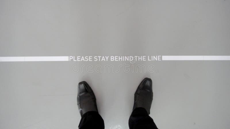 Behind the Line and Loading Sign Stock Image - Image of complete, empty ...
