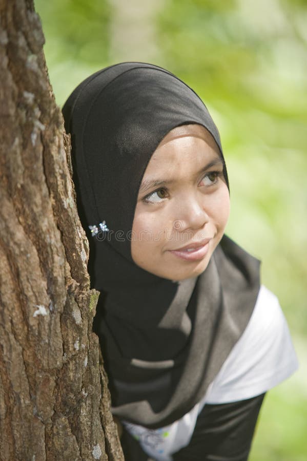 Behind the tree stock photo. Image of peek, bark, peeking - 10122744