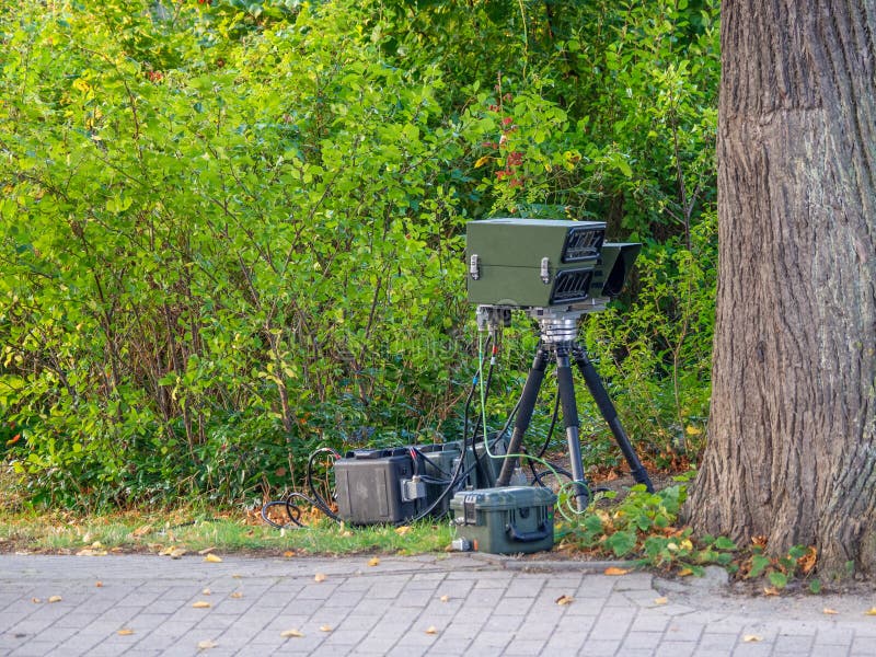 Behind the Tree is Radar Trap for Speed Monitoring Editorial Photo ...