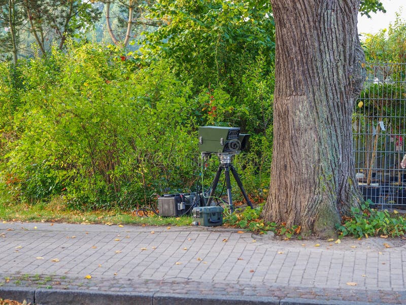 Behind the Tree is Radar Trap for Speed Monitoring Editorial Stock ...