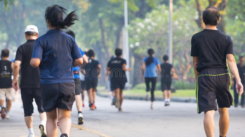 Behind View of Back of People Run at Tree Garden Editorial Stock Image ...