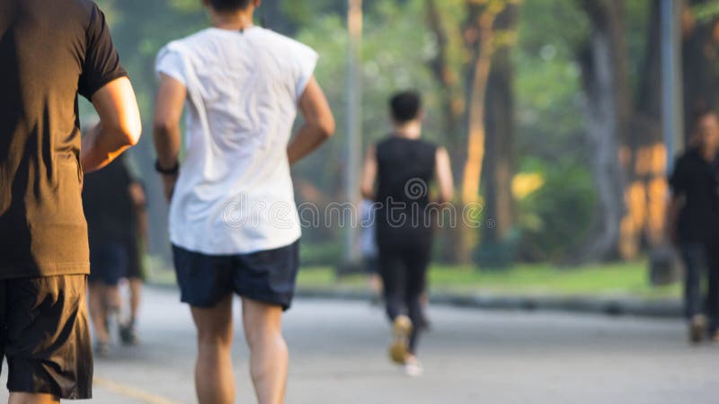 Behind View of Back of People Run at Tree Garden Stock Photo - Image of ...