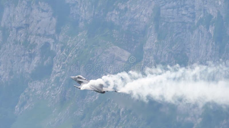 Jet Fighter Flying at High Speed in Gray Sky. Vertical Climb To Show ...