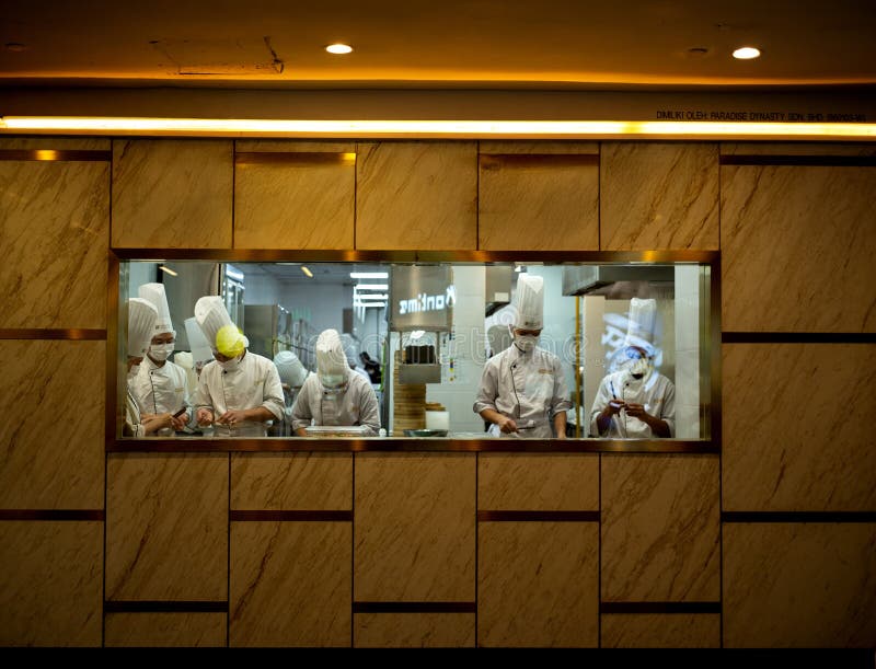 Behind the Window: Chefs at Work in Paradise Dynasty Kitchen Editorial ...