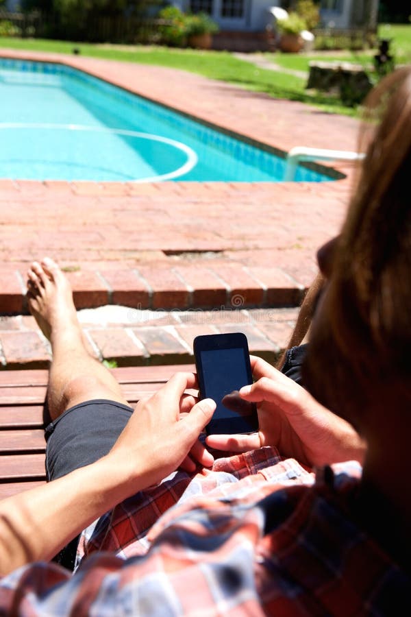 Modern Man Using Cellphone On The Pool. Stock Image - Image of hand ...