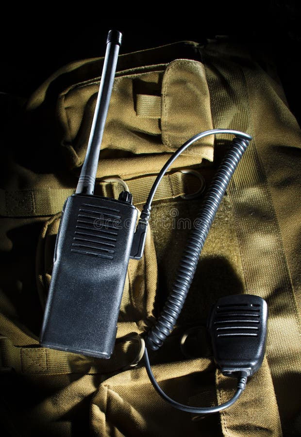 Beige backpack and radio stock image. Image of walkie - 163732545