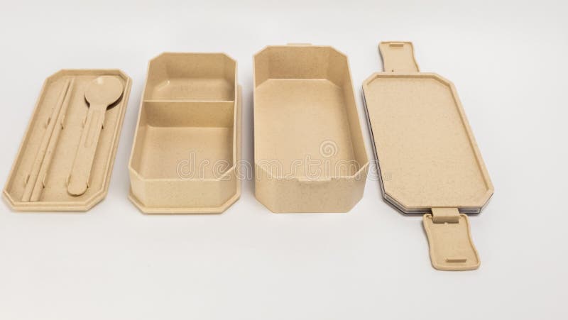 Beige Bento Box with Chopsticks Spoon and Compartments on White ...