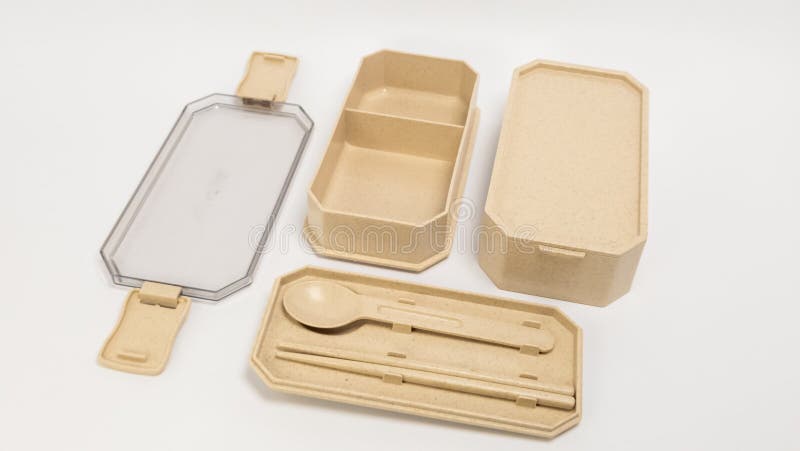 Beige Bento Box with Utensils and Clear Lid on a White Background Stock ...