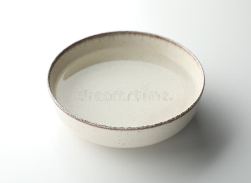 Beige Bowl Full of Water on White Background Stock Image - Image of ...