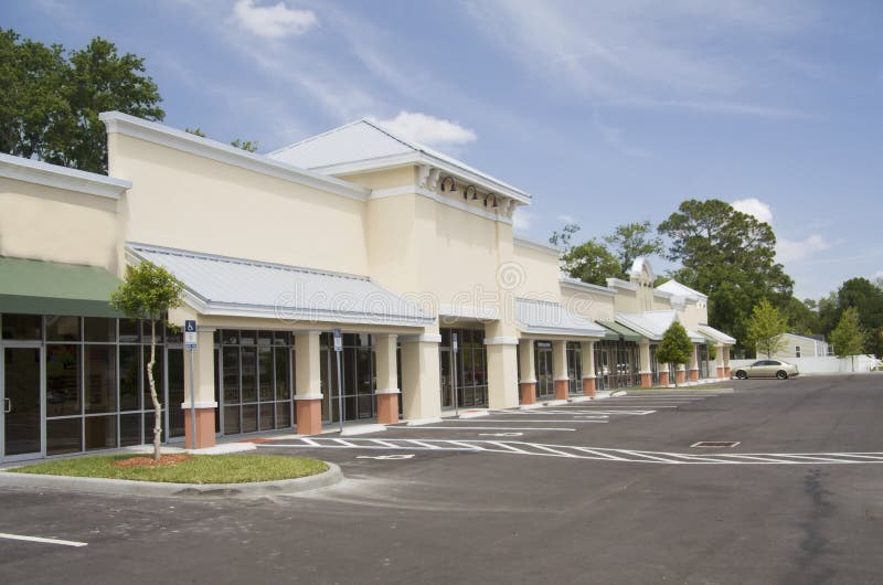 Upscale beige strip mall stock image. Image of pastel - 9422691