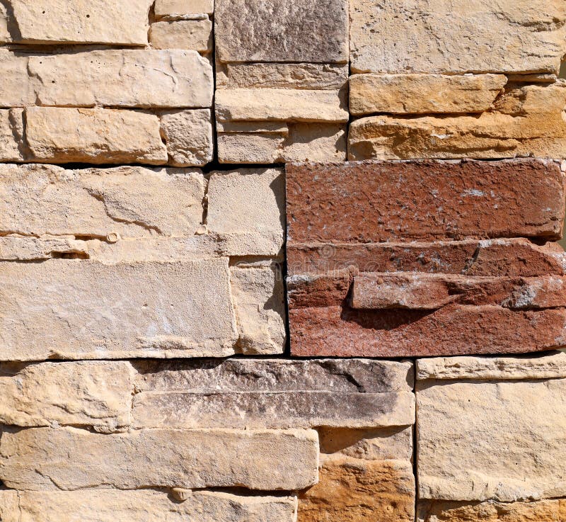 Beige and Brown Exterior Wall Cladding Made of Irregular Stone Bricks ...