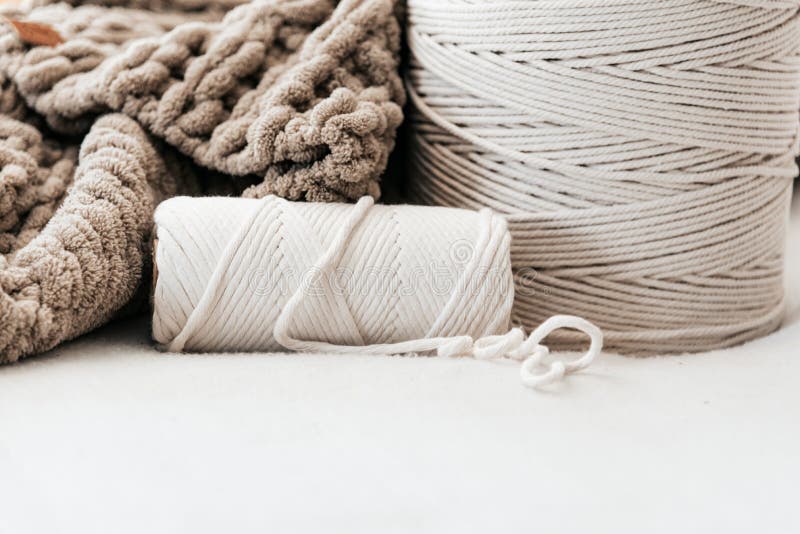Beige Cable Knit Blanket with Natural White Macrame Cord on White ...