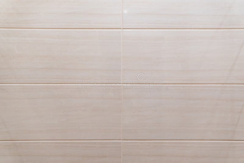 Beige Ceramic Tiles on the Wall. Materials for Renovation in the House ...