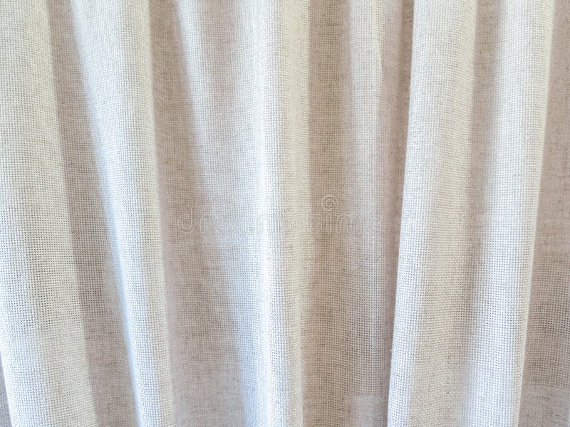 Beige Curtains Made of Natural Linen with Many Folds Stock Photo ...