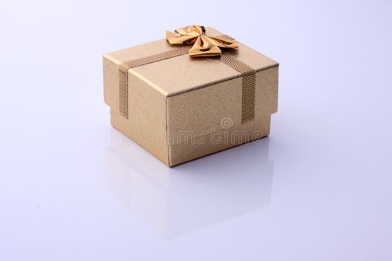 Beige/Golden gift box stock photo. Image of neat, decorated - 3994596