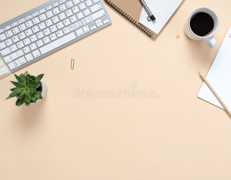 Beige Home Office Desk with Coffee, Keyboard, and Plant Stock Photo ...