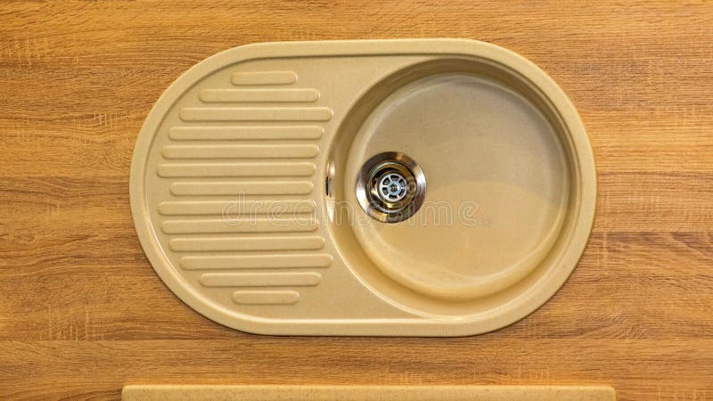 Beige Kitchen Sink stock photo. Image of shape, oval - 261052648
