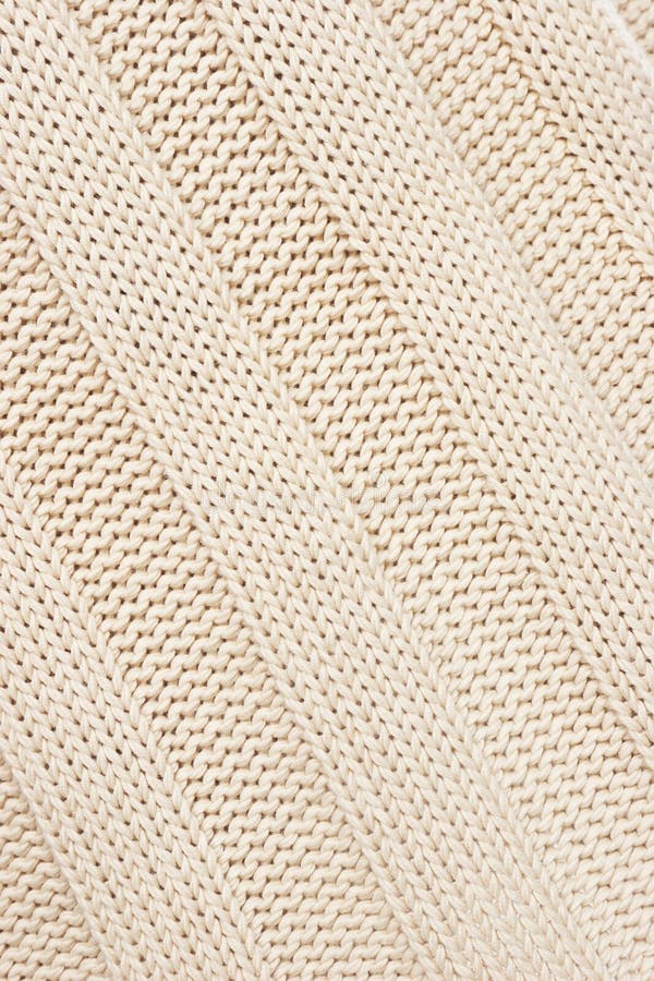 Beige knitted fabric. stock image. Image of needlework - 18653835