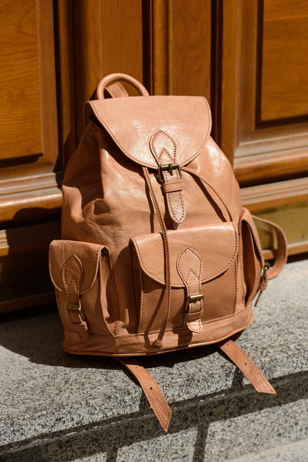 Beige Leather Oldfashioned Backpack. Outdoors Photo Stock Image - Image ...