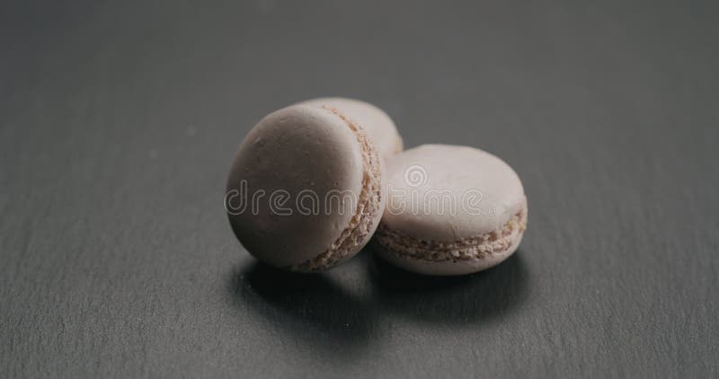 Beige Macarons on Slate Board Stock Image - Image of bakery, biscuit ...