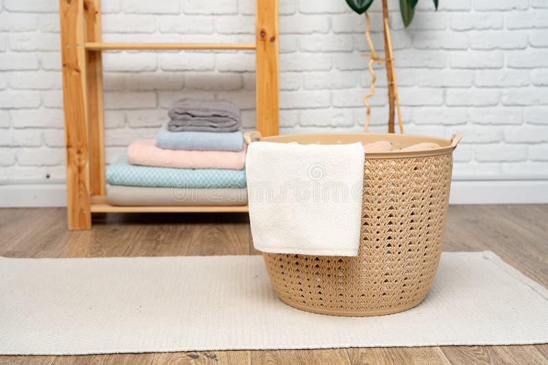 Beige Plastic Basket for Laundry in a Room Stock Image - Image of clean ...