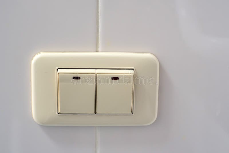 Beige Rocker Light Switch with Two Buttons Stock Photo - Image of ...