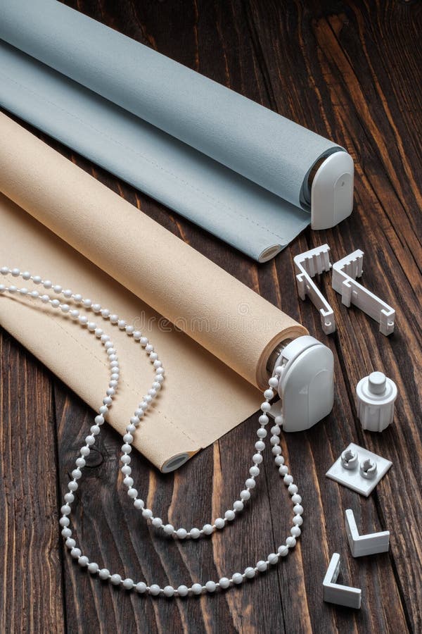 The Beige Rolled Blind is on a Wooden Surface. Stock Image - Image of ...