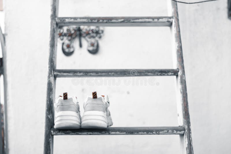 Beige Slippers on a Ladder in a Country House Stock Photo - Image of ...
