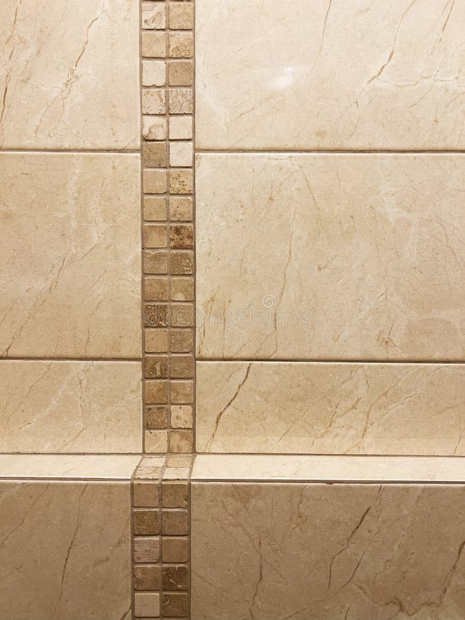 Beige Stone Tiles with Mosaic Accent and Natural Marbled Texture Stock ...