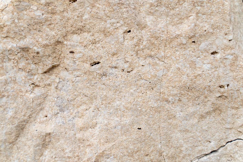 Beige Stone Wall Background. the Texture of the Stone. Stock Photo ...