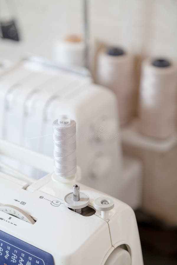Beige Thread on Sewing Machine Stock Image - Image of fashion, stitch ...