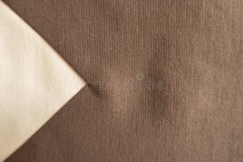 Beige Triangular Gusset Sewn To Brown Fabric Stock Image - Image of ...