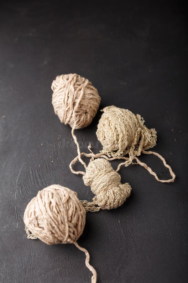 Beige Yarn Balls on Black Background, Copy Space. Knitting and ...