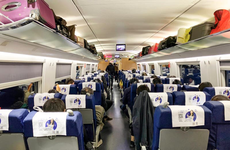 Passengers Sitting Inside of a China Railway High Speed Bullet Train ...