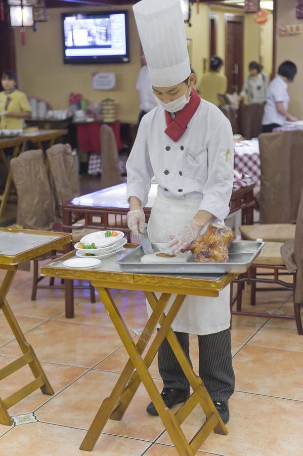 Beijing duck being cut editorial stock image. Image of peking - 28271029