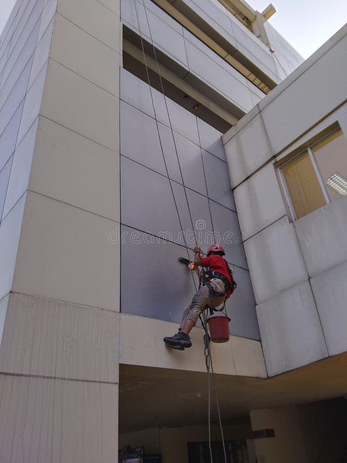 Cleaning a building stock photo. Image of people, altitude - 2017256