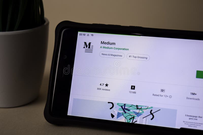 Medium Dev Application on Smartphone Screen. Medium is a Freeware Web ...