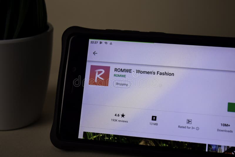 ROMWE Dev Application on Smartphone Screen. Women`s Fashion is a ...