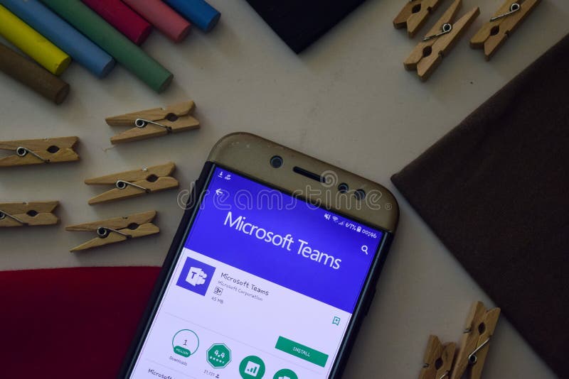 Microsoft Teams App with Magnifying on Smartphone Screen. Editorial ...