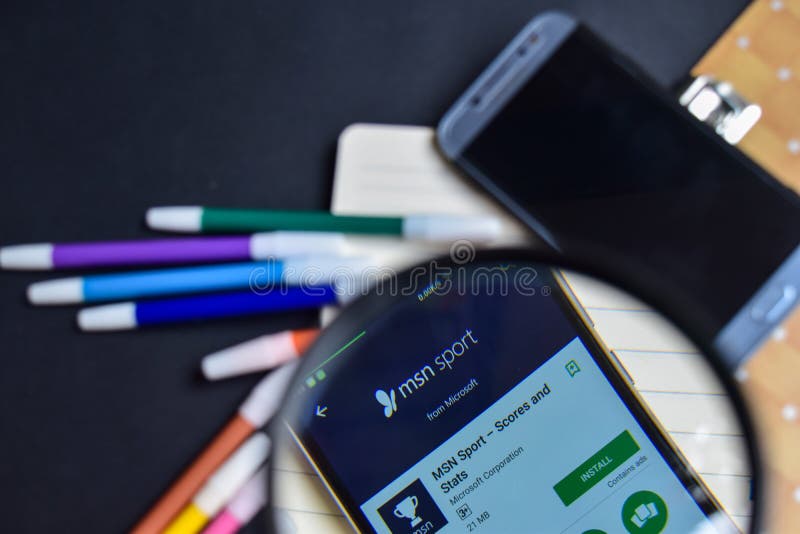 MSN Sport - Scores and Stats App with Magnifying on Smartphone Screen ...