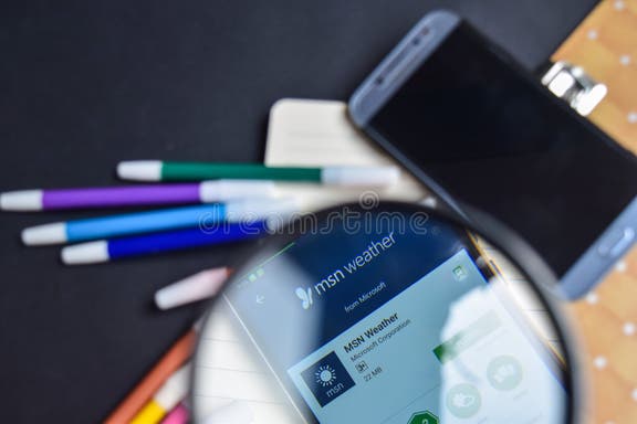 MSN Weather App with Magnifying on Smartphone Screen. Editorial ...
