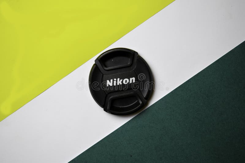 Office Table with Nikon Lens Cap on Color Background Editorial Stock ...