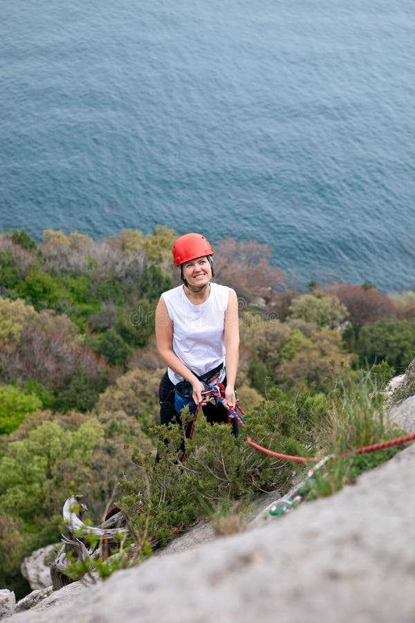 Belayer Watching Lead Climber Stock Photo - Image of blond, person ...